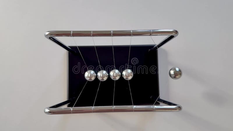 Newtons Cradle Motion Momentum Energy Metal Balls Physics Stock Photos ...