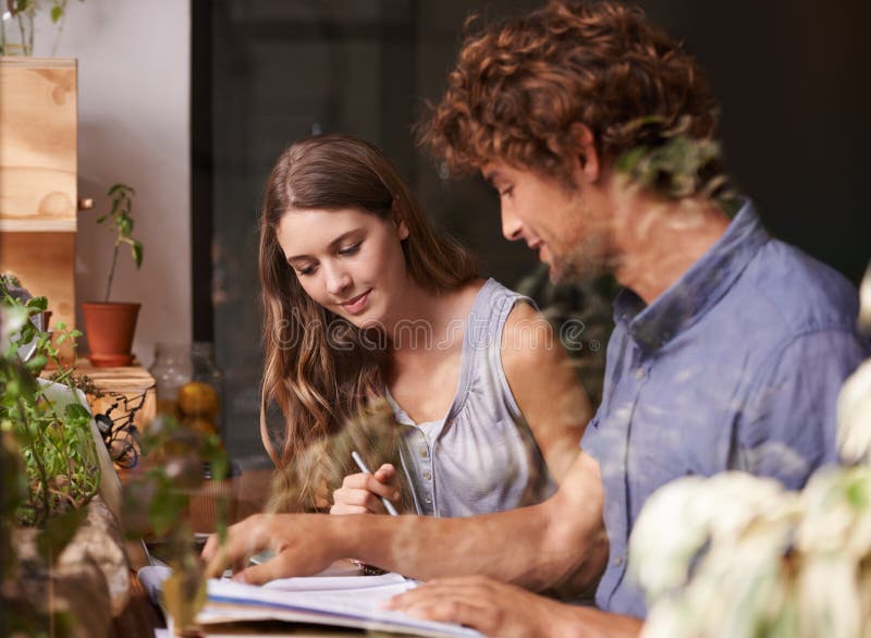 Next Chapter. Two Young Students Doing Revision in a Coffee Shop. Stock ...