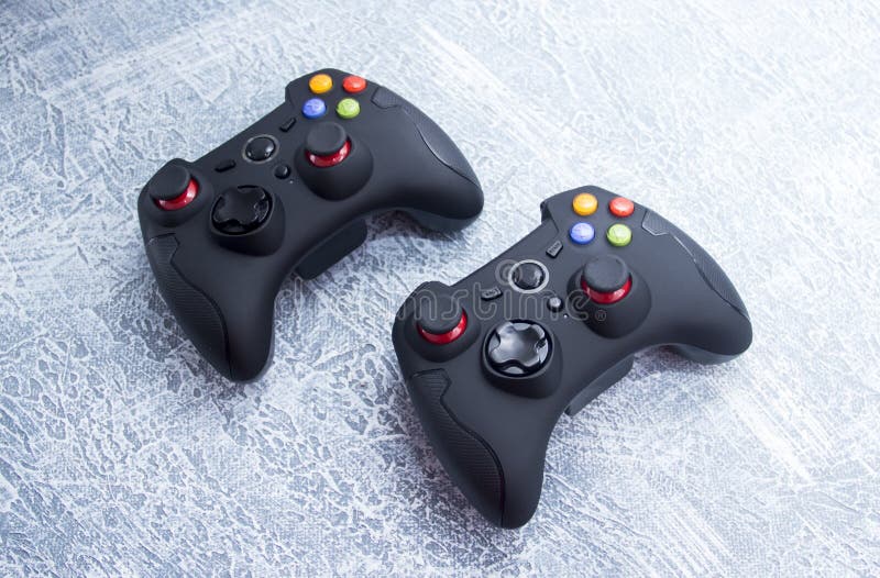 Next-generation Game Controllers. Two Black Gamepads. Black Joystick ...