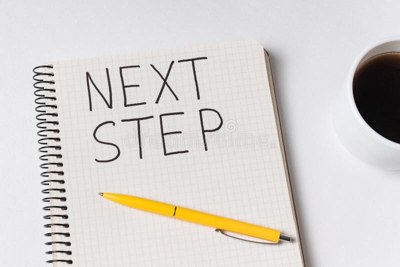 NEXT STEP Words of Inscription Handwriting in Notepad. Close-up of ...