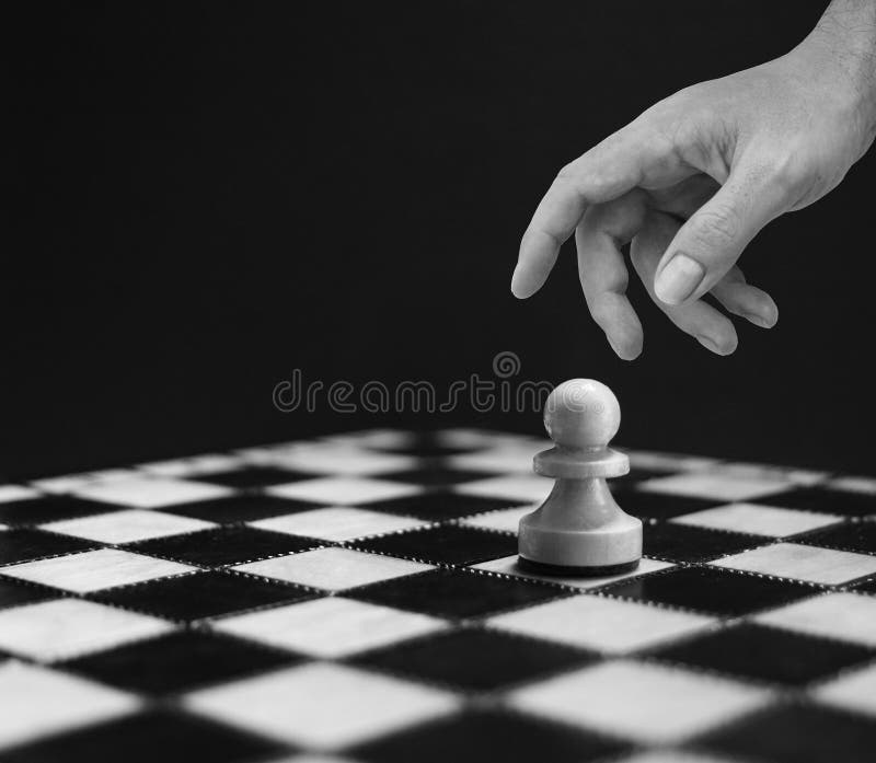 Next Steps are Shown with Photo of Hand with Pawn on the Chessboard ...