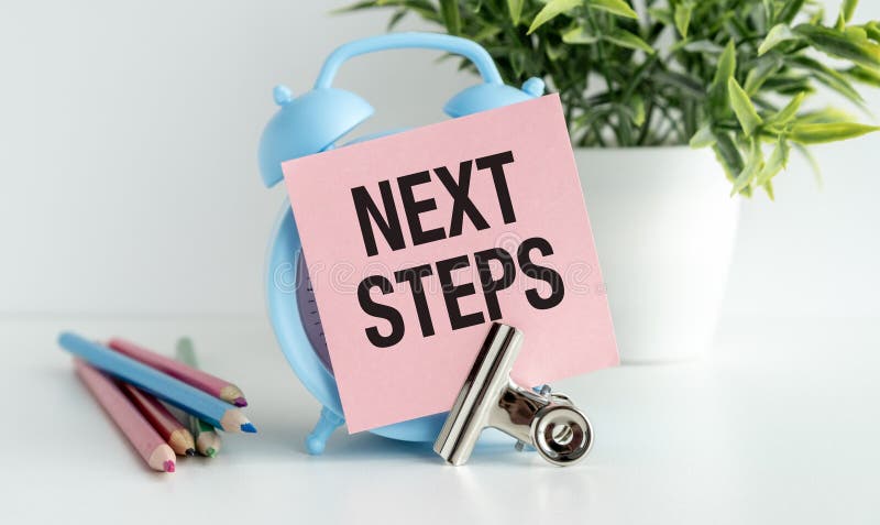 Next Steps Text on Clock. Text on Office Paper Notepad Stock Photo ...