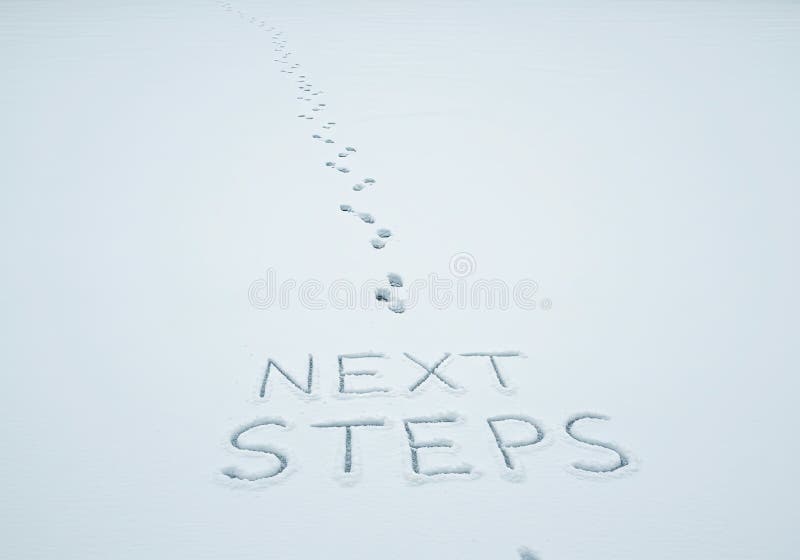 Next Steps Text Near Trail Footprints in Winter Setting Stock ...