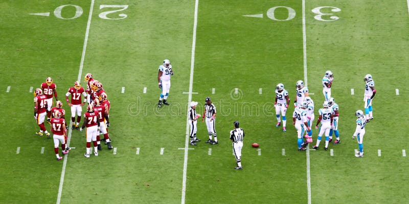NFL - Two Teams in the Huddle Editorial Stock Image - Image of hike ...