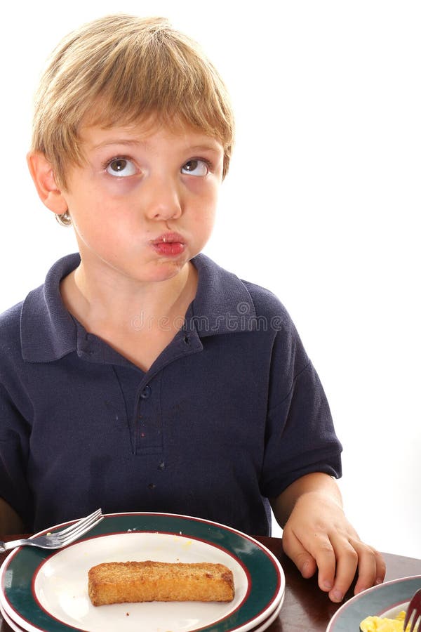 Niño Pequeño Que Mastica Con La Boca Llena Foto de archivo - Imagen de ...