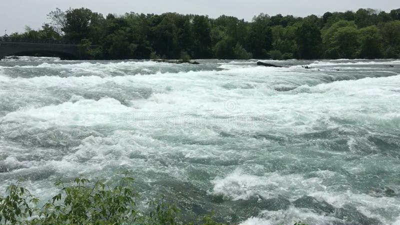 River Flow Over Stones. Water Flows from a Waterfall. Green Water in ...