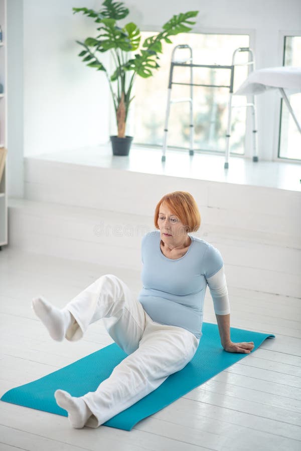 Nice Active Aged Woman Raising Her Leg Stock Photo - Image of mature ...