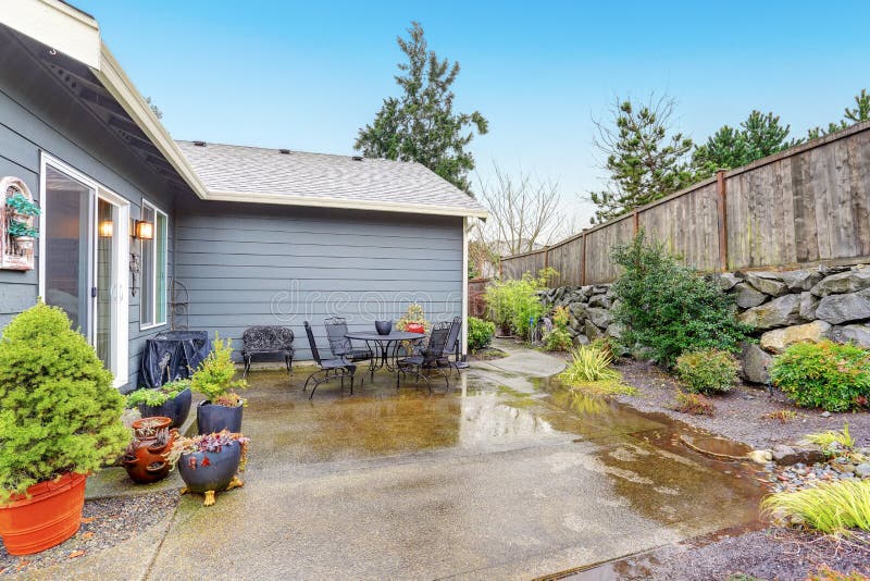 Nice Back Yard with Large Patio and Chairs. Stock Image - Image of ...