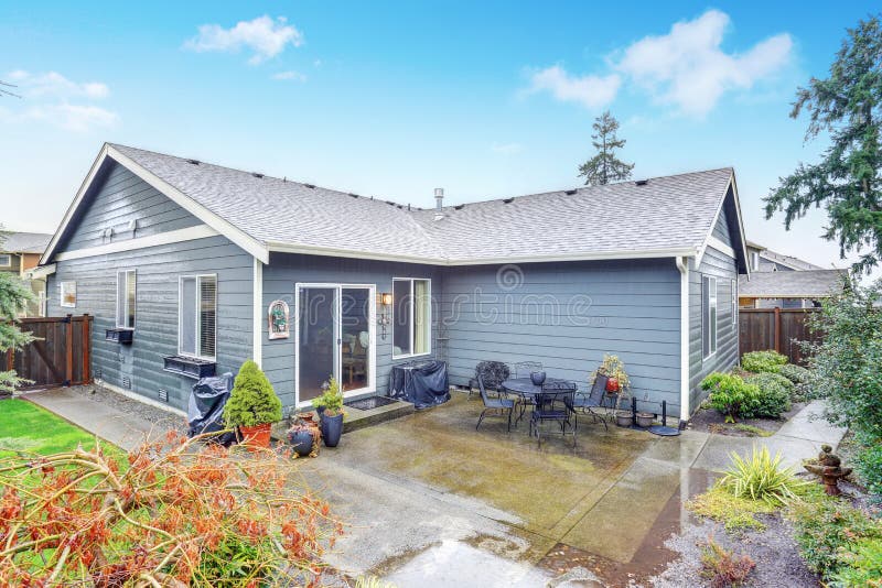 Nice Back Yard with Large Patio and Chairs. Stock Photo - Image of ...
