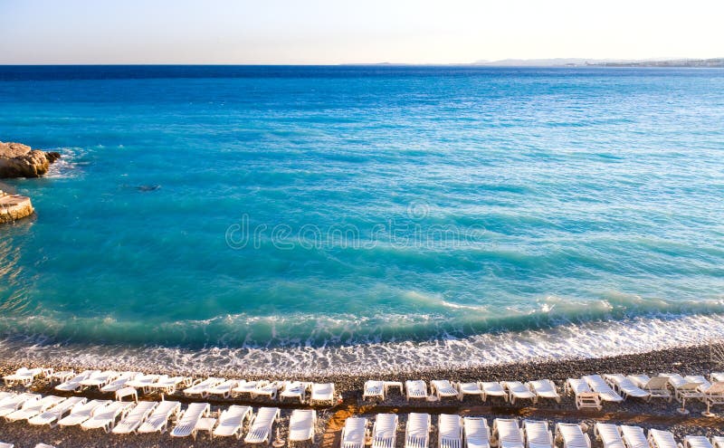 Nice Beach with Chaise-longue Stock Photo - Image of resort, nice: 5703522