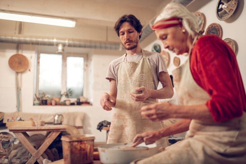 Nice Bearded Man Looking at the Ceramics Jigger Stock Image - Image of ...
