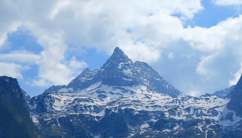 Nice Big Snowy Mountain and White Clouds Stock Image - Image of blue ...