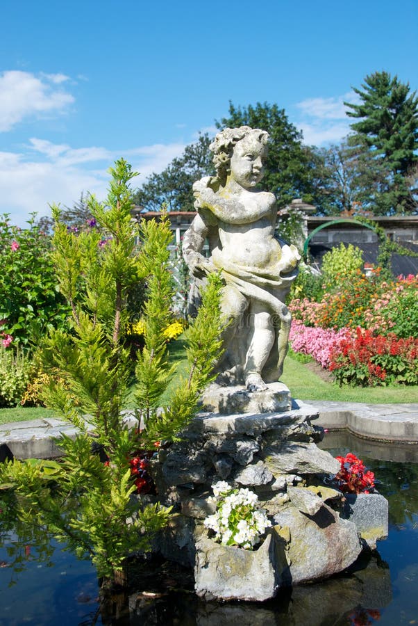 Nice Botanic Garden with Statue Stock Photo - Image of blue, green ...