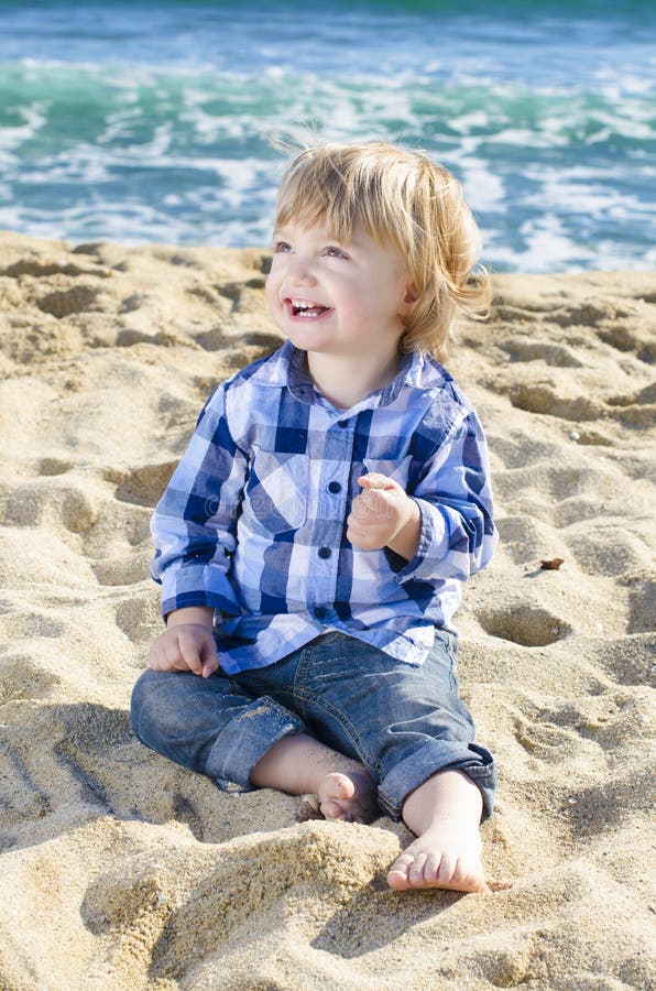 A nice boy on the beach stock image. Image of baby, look - 28188625