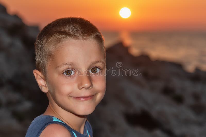 A Nice Boy on the Beach at Sunset Stock Photo - Image of ethnicity ...