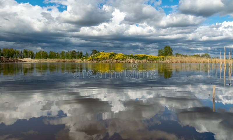 Calm Scene of Beautiful Sky with Cumulus Clouds Reflection on the Lake ...