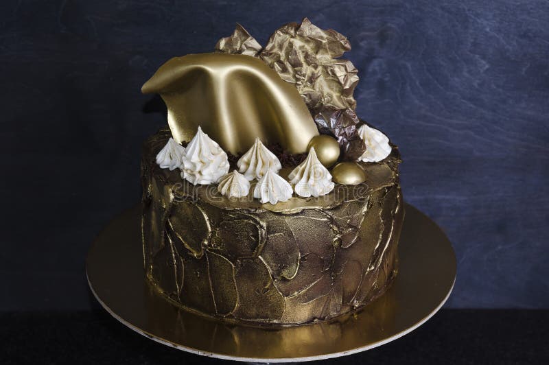 Nice Chocolate Gilded Cake with Merengues and Sails Stock Photo - Image ...