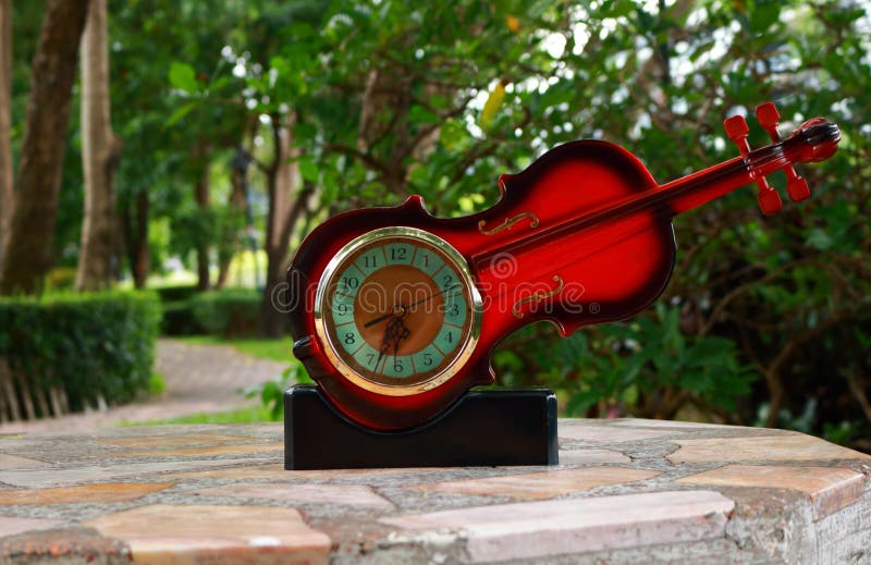 Beautiful Violin Shape Clock Stock Image - Image of beauty, closeup ...