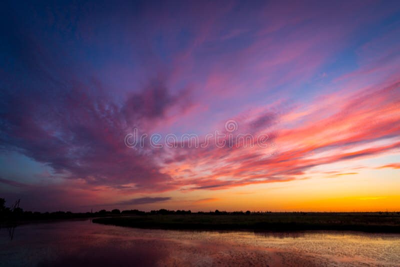 Sunser over river stock photo. Image of orange, river - 121568226