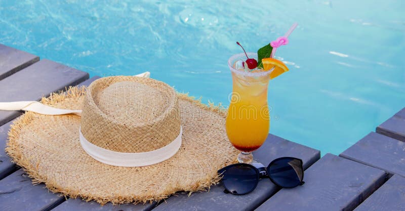 A Nice Cocktail, Hat and Sunglasses by the Pool Stock Photo - Image of ...