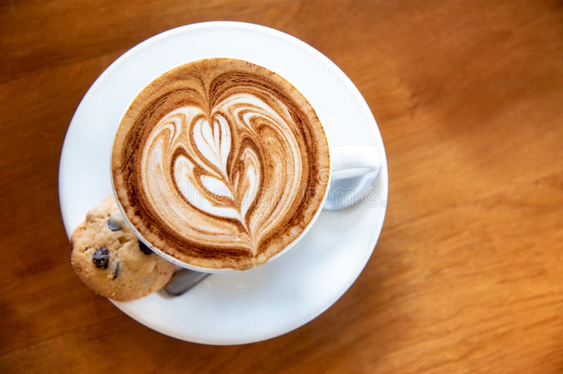 Nice Coffee Latte with Cookie Stock Photo - Image of gourmet, angle ...