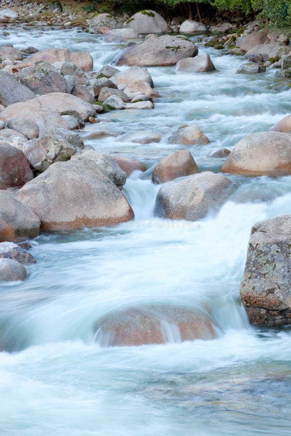 Water flowing over rocks stock image. Image of waves, moss - 275239