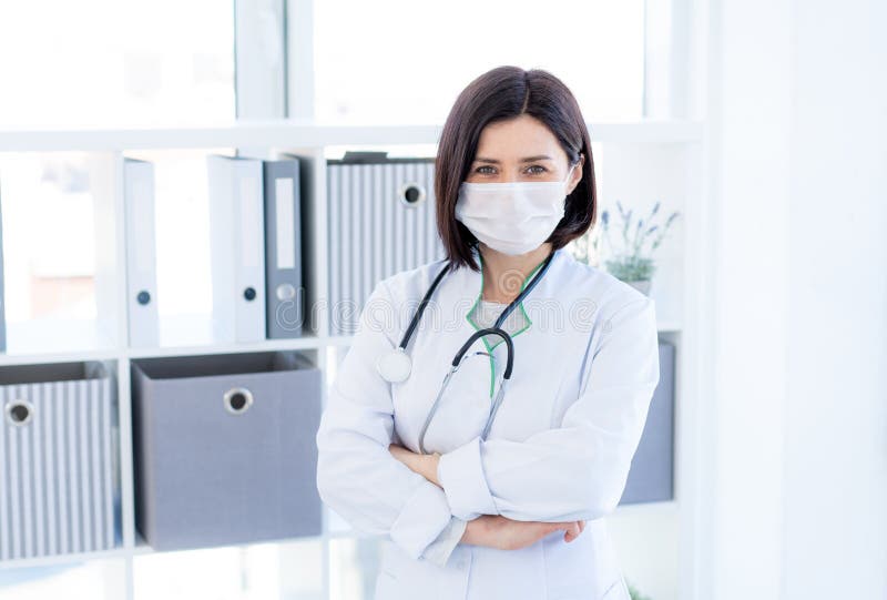 Nice Doctor in Light Office Stock Image - Image of mask, doctor: 178549955