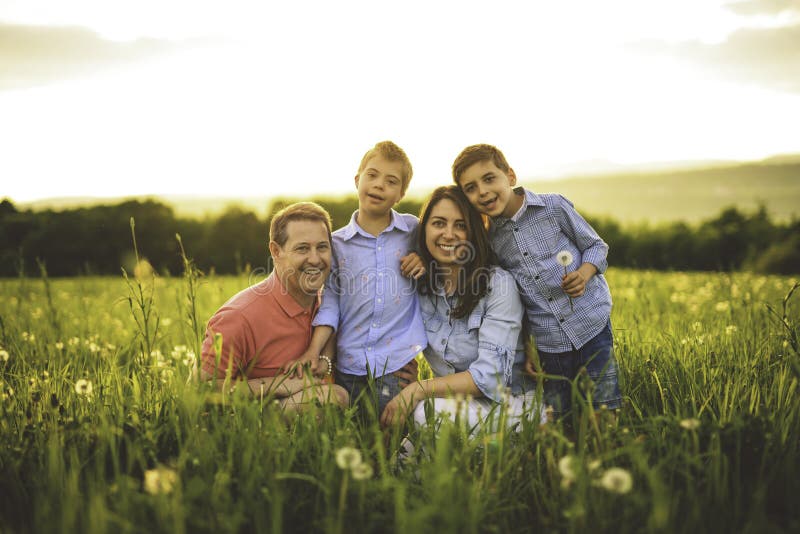 Nice Family Playing on Great Field at Sunset Stock Image - Image of ...