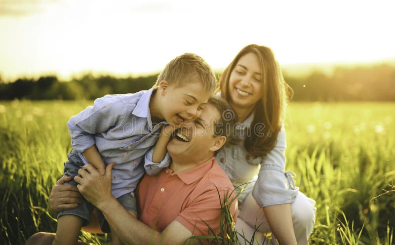 Nice Family Playing on Great Field at Sunset Stock Image - Image of ...