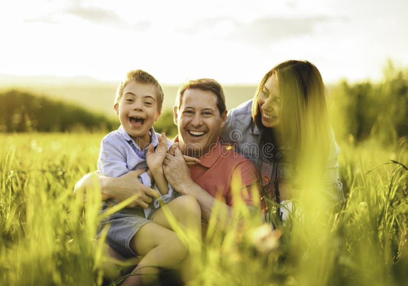 Nice Family Playing on Great Field at Sunset Stock Photo - Image of ...