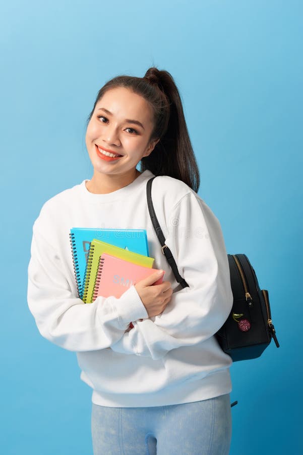 Nice Female Student Smiling and Looking at Camera Stock Photo - Image ...