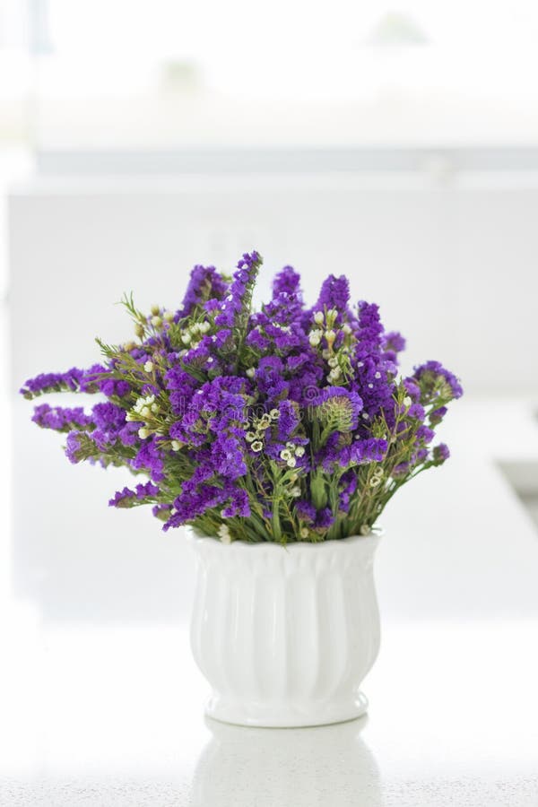 Nice Flower Arrangement with Purple Statice Decorating the Spaces of a ...