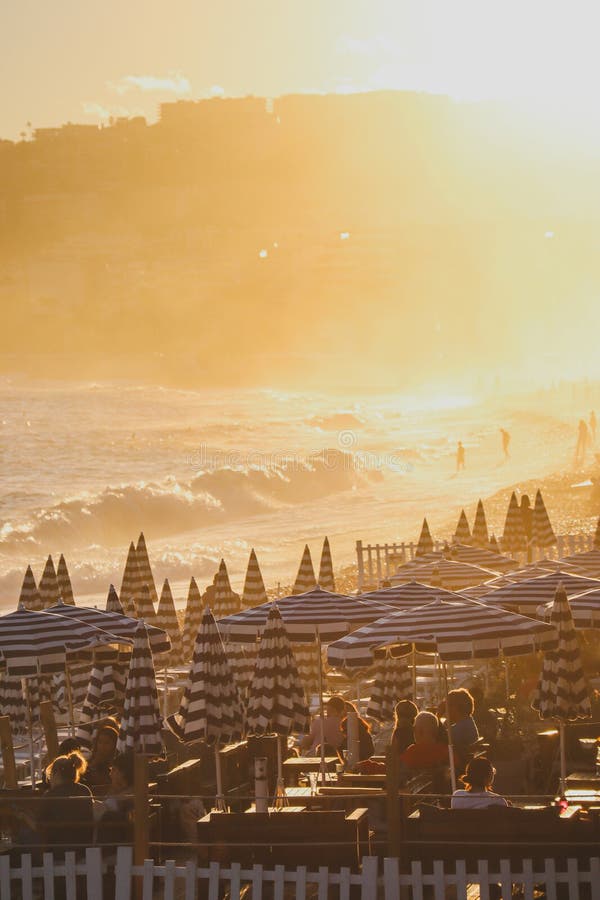 Beach in Nice with Big Waves in the Light of the Setting Sun Editorial ...