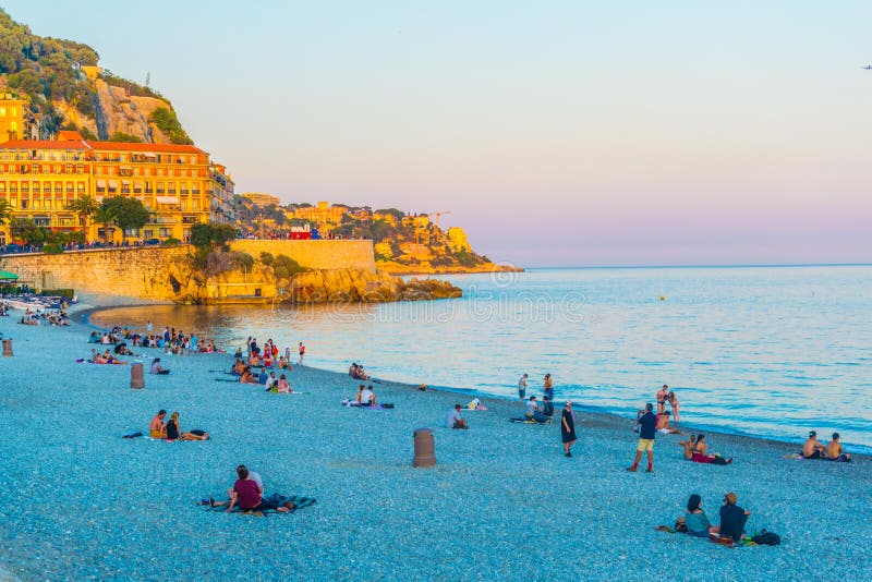 NICE, FRANCE, JUNE 11, 2017: Sunset View of People on a Beach in Nice ...