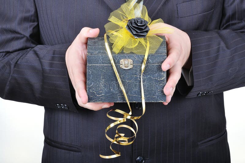 Nice Gift Chest in Hands of Businessman Stock Photo - Image of ...