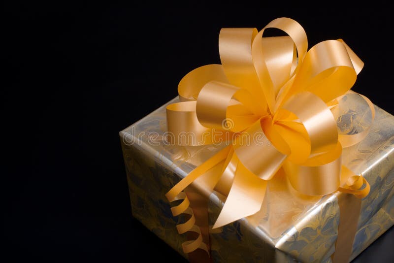 Nice Gift Packed in Golden Paper on Black Stock Image - Image of happy ...