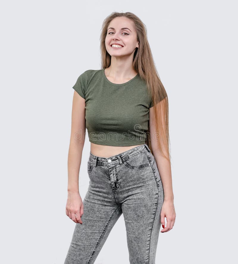 Nice Girl With Beautiful Breasts In A Green T Shirt Posing On Ca Stock