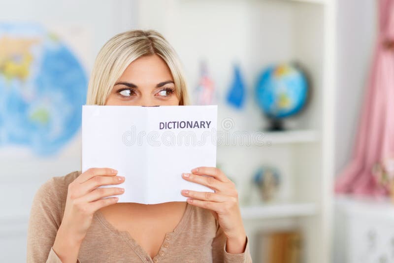 Nice Girl Reading Dictionary Stock Photos - Free & Royalty-Free Stock ...