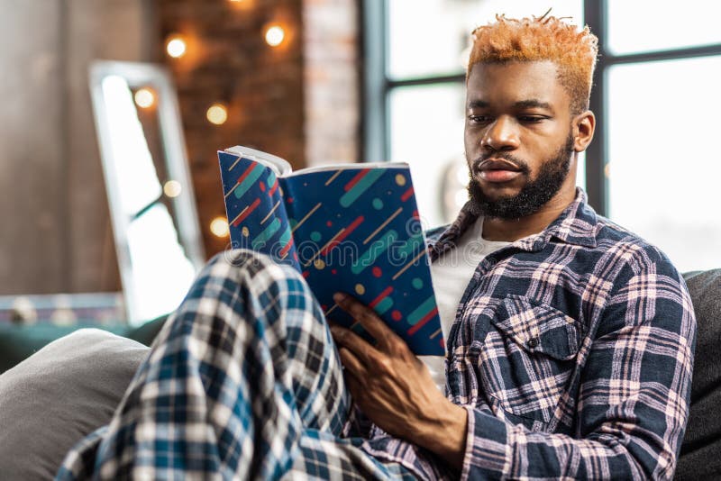 Nice Good Looking Man Enjoying Reading a Book Stock Photo - Image of ...