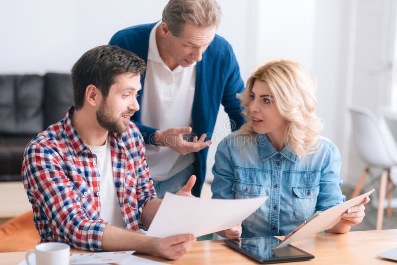 Nice Good Looking People Discussing a Project Stock Photo - Image of ...