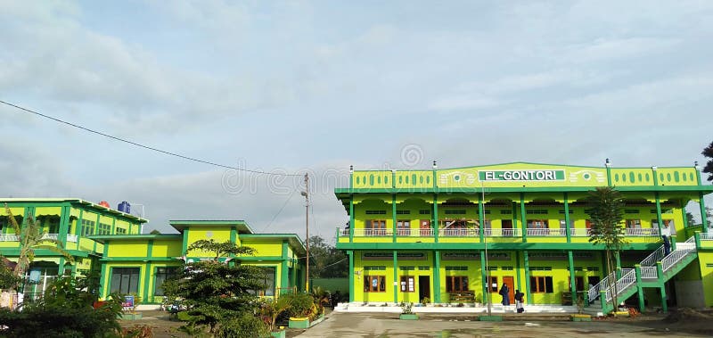 Nice Green Building Behind There is Green Sky Editorial Image - Image ...