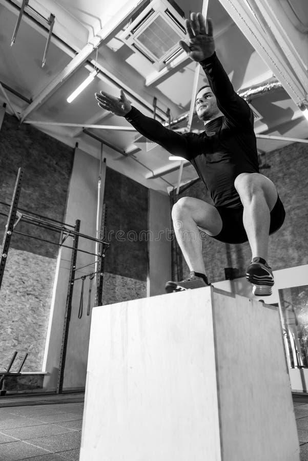 Nice handsome man jumping stock photo. Image of biceps - 81896362