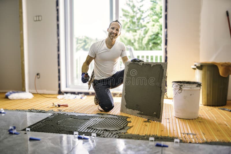 Nice Handyman Install Tile on the Floor Stock Image - Image of laborer ...