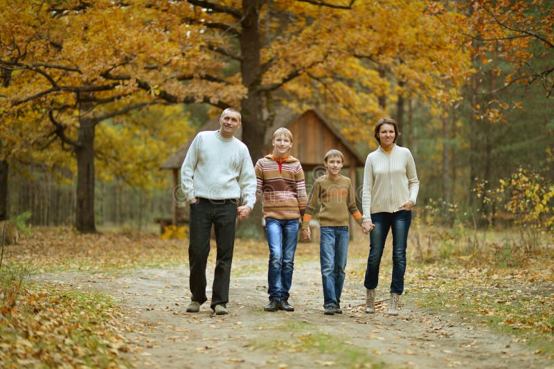 Nice happy family stock image. Image of brother, foliage - 40194343