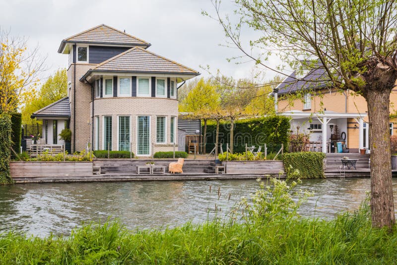 Nice House Near Water and Garden Stock Photo - Image of outdoor ...