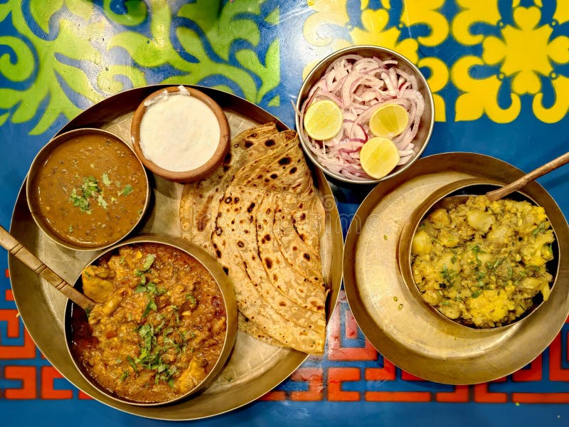 Nice Indian Dinner of Roti, Alu Gobi and Chicken Shaba. Stock Photo ...