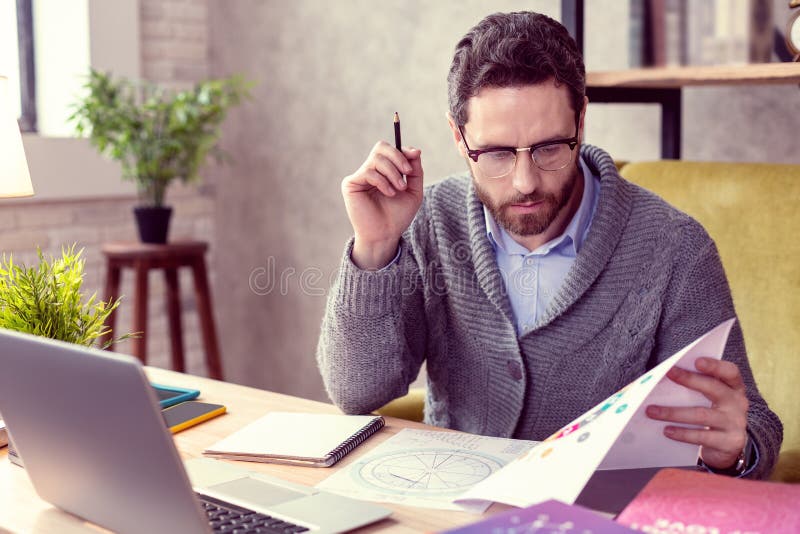 Nice Intelligent Man Focusing on His Work Stock Image - Image of ...