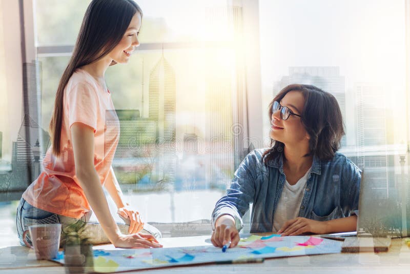 Nice Joyful Women Looking at Each Other Stock Image - Image of igen ...