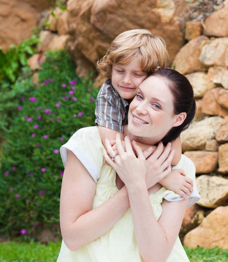 Nice Kid Embracing His Mother Stock Photos - Free & Royalty-Free Stock ...