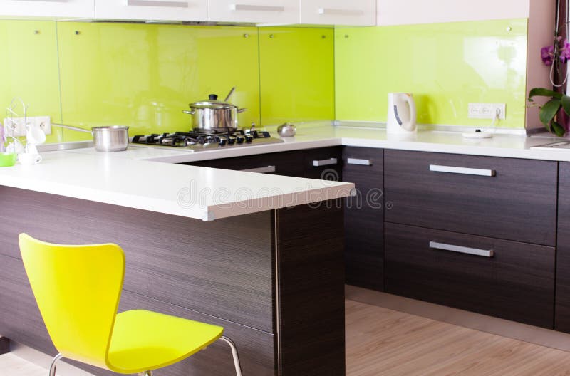 Nice Kitchen with Great Table Worktop and Yellow Chair Stock Photo ...